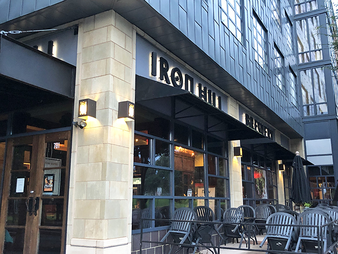 The corner spot that beckons like an old friend. Iron Hill's welcoming exterior promises good times and even better food waiting just beyond those doors.