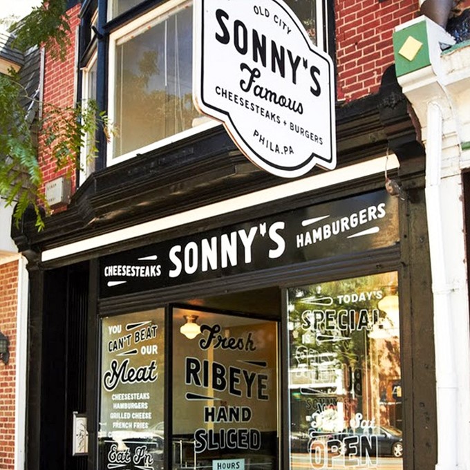 The classic brick storefront of Sonny's Famous Steaks stands like a beacon of hope for the hungry in Philadelphia's historic Old City neighborhood.