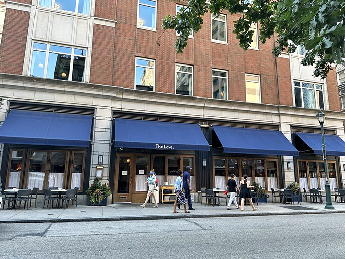 The Love's distinctive blue awnings beckon hungry Philadelphians like a culinary lighthouse on Rittenhouse Square. Impossible to miss, impossible to resist.