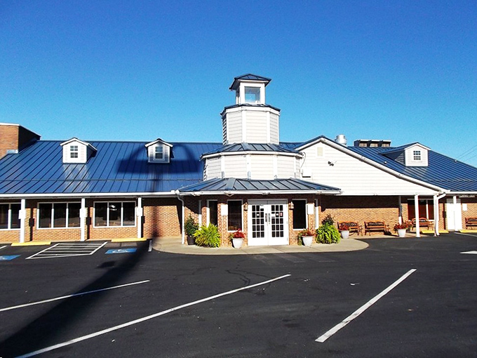 The distinctive blue roof and lighthouse-inspired cupola of Blue Ocean stand like a beacon for seafood lovers in landlocked Clinton.