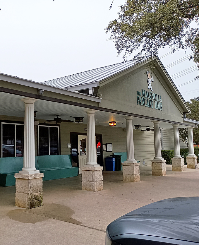 The unassuming exterior of Magnolia Pancake Haus hides culinary greatness like Clark Kent's glasses hide Superman. Those white columns aren't just for show!