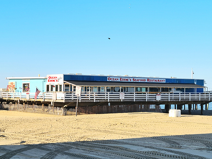 Perched on the pier like a weathered captain's quarters, Ocean Eddies waits patiently for hungry souls.