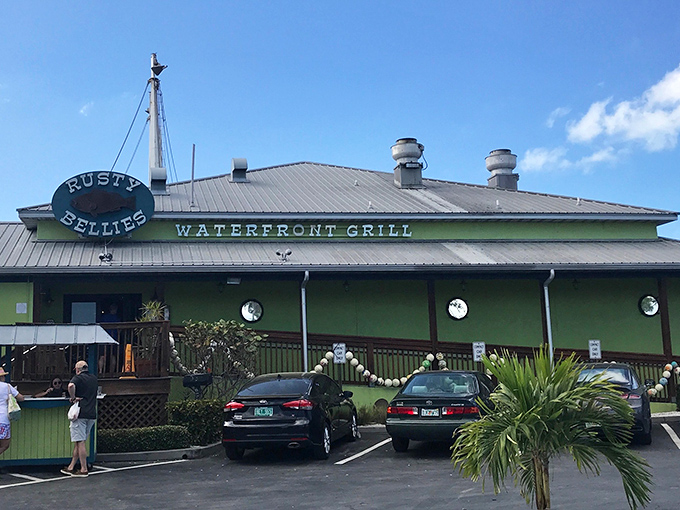 The cheerful yellow exterior of Rusty Bellies promises seafood treasures within, like a maritime version of Willy Wonka's factory&mdash;but with stone crabs instead of chocolate.