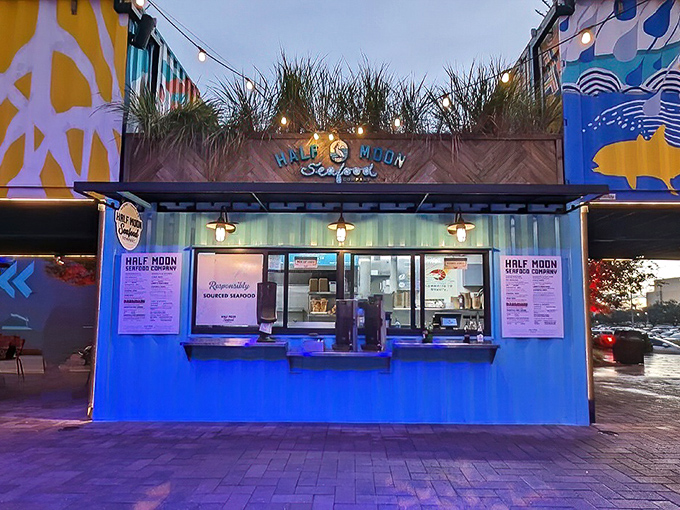 The turquoise shipping container exterior of Half Moon Seafood Co. isn't just eye-catching&mdash;it's a beacon for seafood lovers hiding in plain sight.