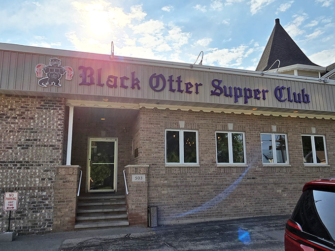 The unassuming exterior of Black Otter Supper Club stands as a beacon of Wisconsin dining tradition, promising comfort and satisfaction beyond its brick fa&ccedil;ade.