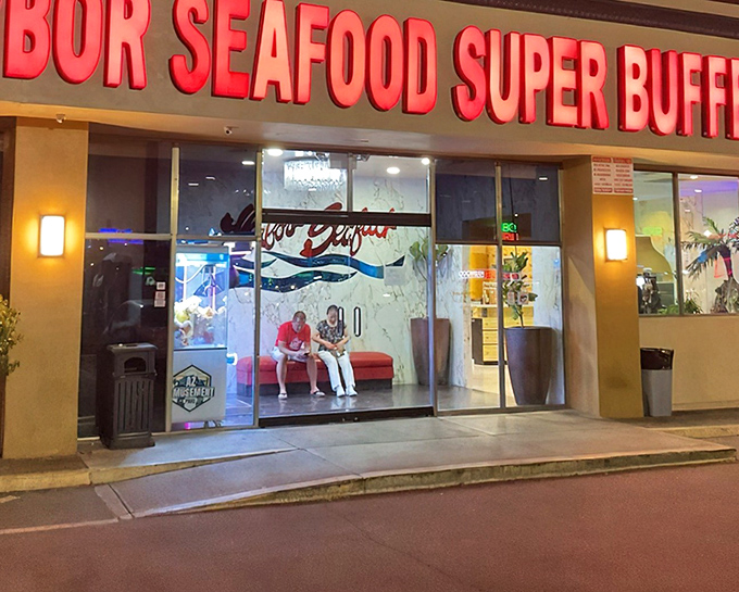 The glowing red sign beckons like a lighthouse for hungry souls adrift in a sea of chain restaurants. Harbor Seafood's modest exterior hides treasures within.