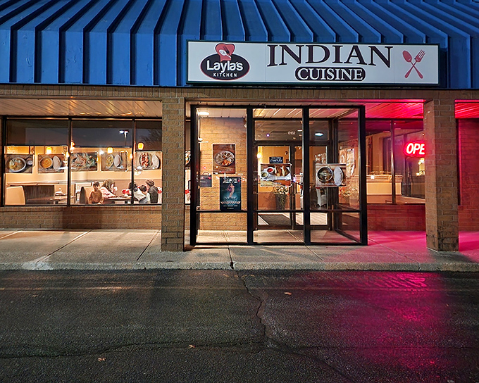 The bright blue roof of Layla's Kitchen stands out like a culinary beacon, promising spice-filled adventures within this unassuming Columbus strip mall.