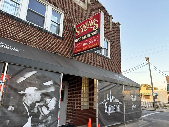 The iconic red Slyman's sign has been beckoning Cleveland sandwich enthusiasts since LBJ was in office. No fancy frills, just a promise of legendary corned beef.