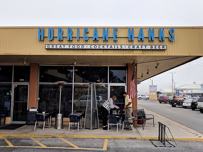 The iconic blue lettering of Hurricane Hanks promises three essentials for Florida happiness: great food, cocktails, and craft beer.
