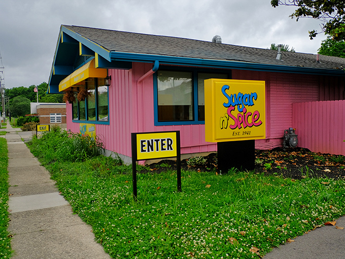 When a building decides to cosplay as pure joy, you get Sugar n' Spice's rainbow exterior.