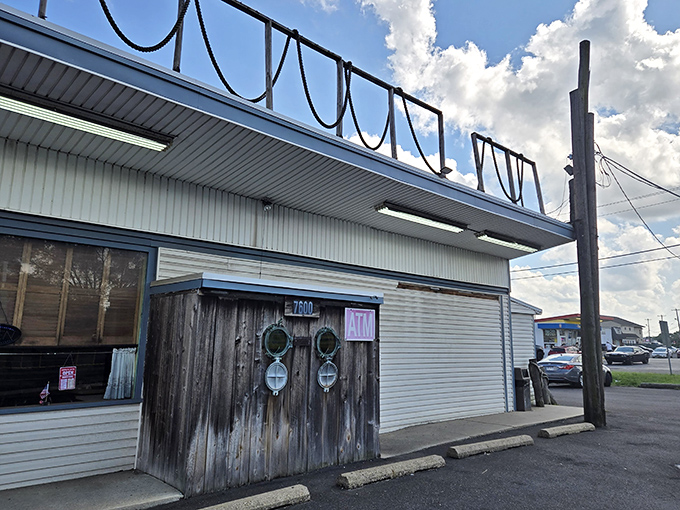 The unassuming exterior of Under the Pier looks like a movie set where seafood dreams and nautical nostalgia collide&mdash;complete with those charming porthole windows.