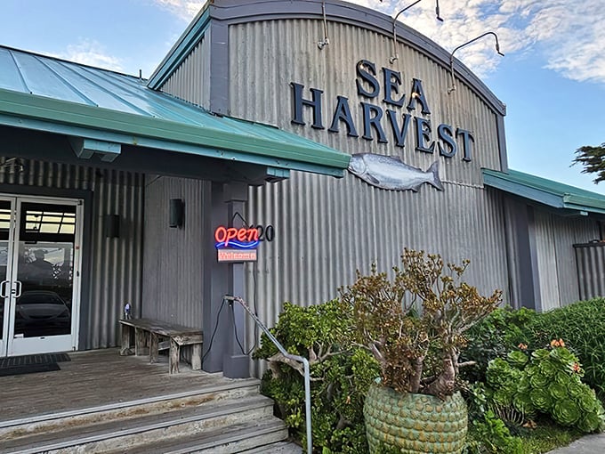 The corrugated metal exterior of Sea Harvest stands like a beacon for seafood lovers&mdash;part industrial charm, part maritime treasure chest waiting to be opened.