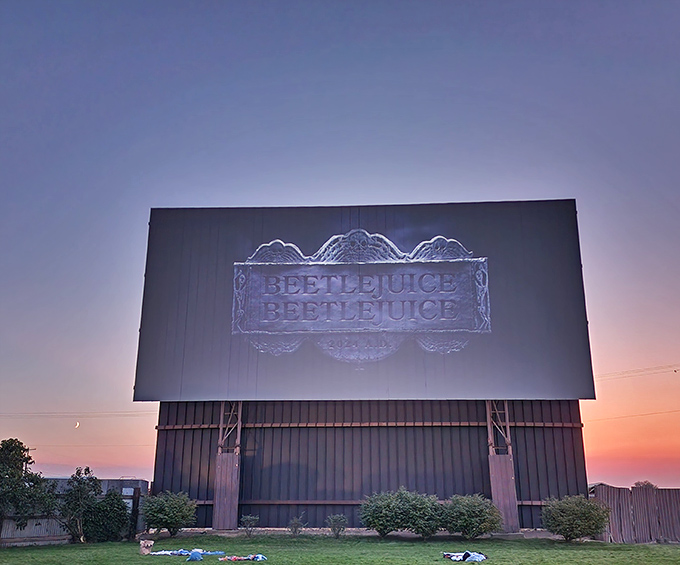 Beetlejuice, Beetlejuice! The massive screen at M-F Drive-In glows against the twilight sky, promising an evening of nostalgic movie magic in Milton-Freewater.