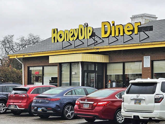 The bright yellow sign of HoneyDip Donuts & Diner stands as a beacon of breakfast hope in Columbus, promising sweet salvation to donut pilgrims.