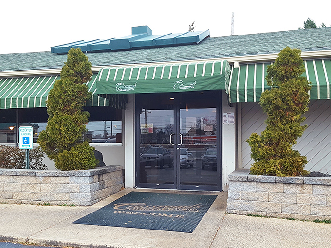 The green-striped awning of Crossroads Restaurant stands as a beacon of breakfast hope, promising comfort food salvation to hungry Delaware residents.