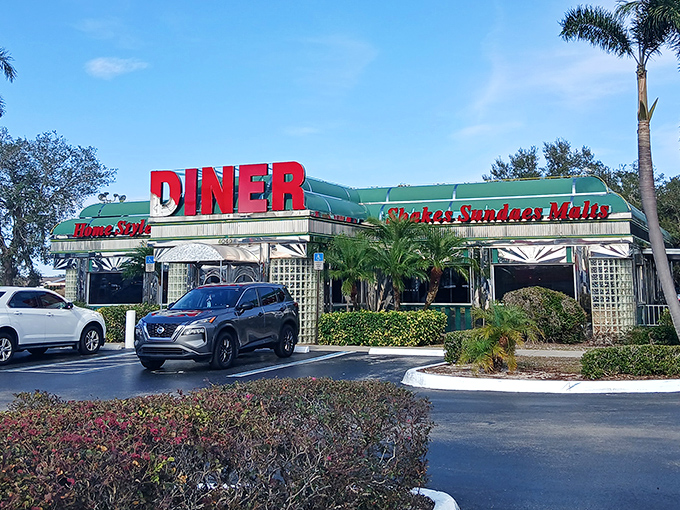 The classic mint-green awning and bold red signage announce "comfort food ahead" like a beacon for hungry travelers on U.S. Highway 27.