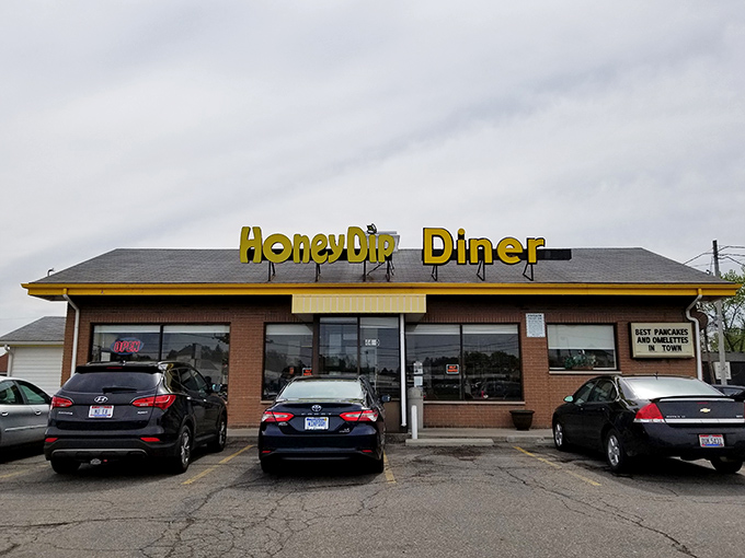 The yellow sign beckons like a lighthouse for the breakfast-deprived. Honey Dip's unassuming exterior hides Columbus's best-kept morning secret.