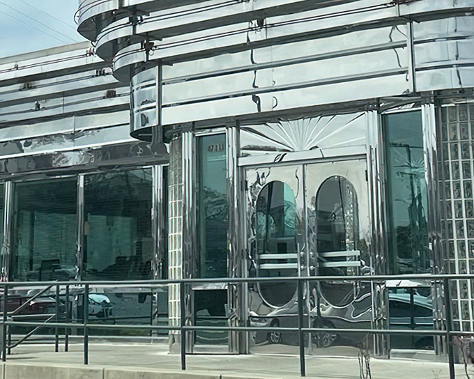 The gleaming stainless steel exterior of Metro 29 Diner stands like a time capsule from the golden age of roadside Americana.