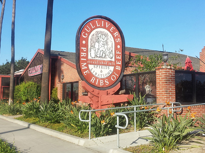 The brick exterior of Gulliver's Restaurant stands like a medieval outpost in Irvine, promising culinary adventures behind those heavy wooden doors. 