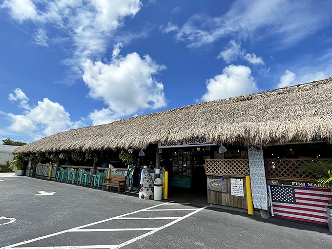 That thatched roof isn't just for show – it's been sheltering seafood lovers through decades of Florida weather.