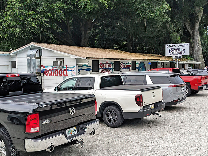 The unassuming exterior of Deal's Famous Oyster House proves once again that the best seafood joints often hide in plain sight, their parking lots filled with those in-the-know.