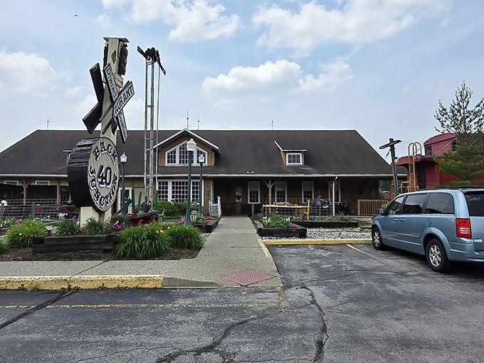 The iconic railroad crossing sign welcomes hungry travelers to Back 40 Junction, where Decatur's finest steaks await in this charming country-style building.