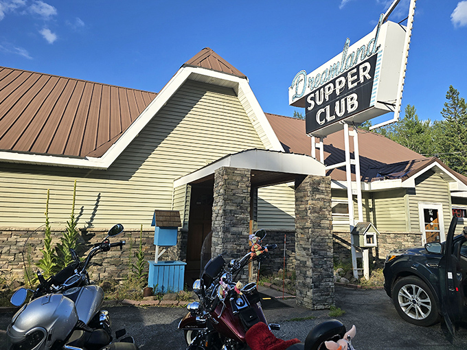 The classic supper club exterior beckons with its vintage sign and stone columns&mdash;motorcycles out front always a good sign that locals know something you don't.