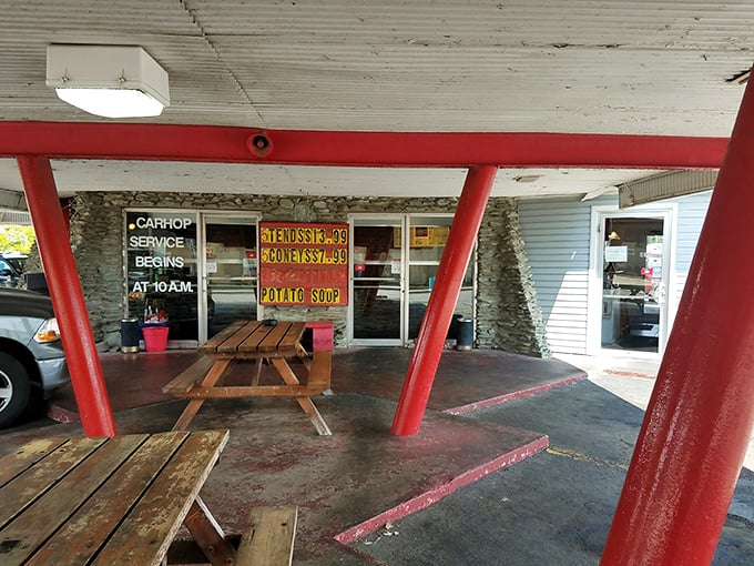 The iconic red pillars of Ray's Drive-In stand like sentinels guarding the promised land of tenderloin. Car hop service begins at 10 AM for those who prefer dining al fresco&mdash;in their Buick.
