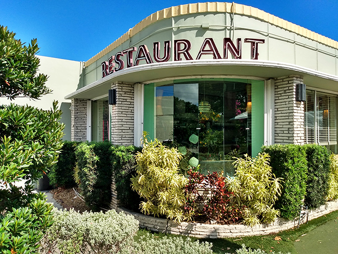 The mint-green time machine of Howley's beckons with its classic "RESTAURANT" sign&mdash;a mid-century promise of comfort that never goes out of style.