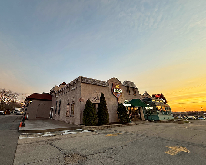 The stucco facade of Lino's glows at sunset like a Mediterranean mirage in the Midwest, complete with vintage signage that's been guiding hungry travelers for generations.