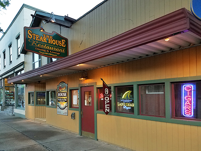 The quintessential small-town steakhouse experience awaits behind this charming yellow facade. Rustic barrels and sidewalk seating invite you to linger on Wellsboro's historic Main Street.