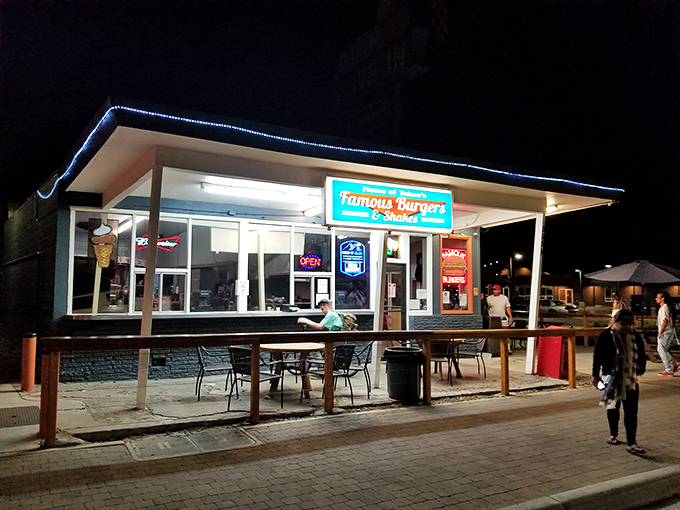The neon glow of Sno-Flake Drive-In beckons like a lighthouse for hungry travelers. This humble roadside haven has been satisfying Tahoe cravings long before "foodie" was even a word.
