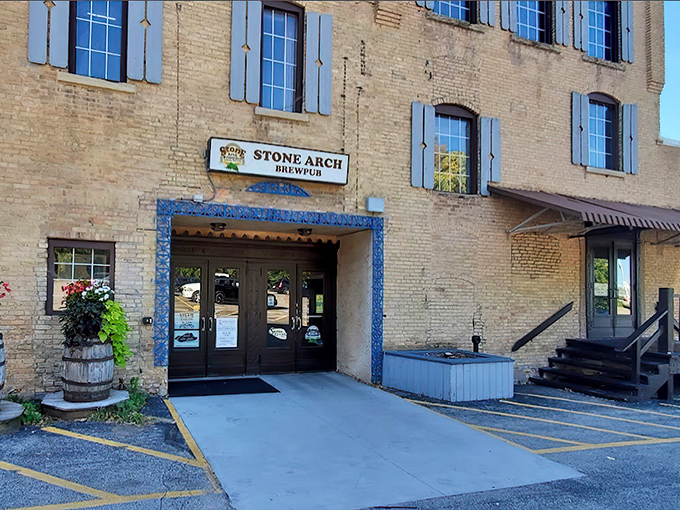 Stone Arch Brewpub's historic brick exterior stands proudly in Appleton, those blue shutters like a wink saying, "Yes, we've got stories to tell and brews to share."
