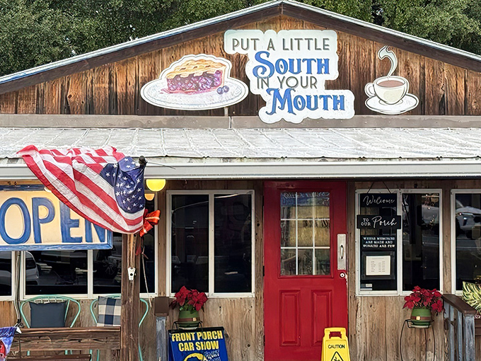 The promise of Southern comfort beckons from this rustic wooden facade. That red door isn't just an entrance&mdash;it's a portal to flavor country.
