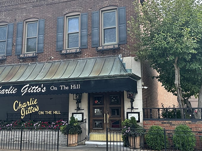 The classic brick fa&ccedil;ade of Charlie Gitto's On The Hill stands as a culinary landmark in St. Louis, promising Italian delights behind those wooden doors.