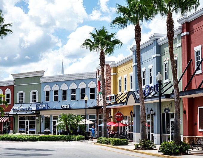 Tradition Square brings small-town charm with big-city convenience. These colorful storefronts under swaying palms create the perfect backdrop for afternoon strolls and impromptu coffee dates.