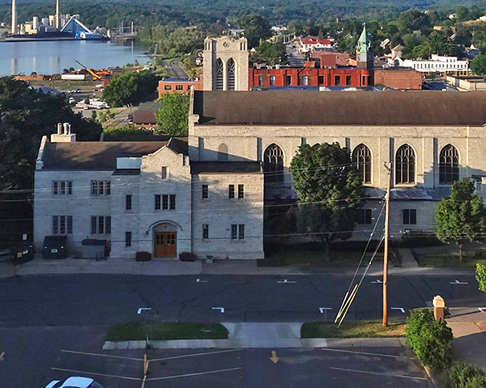 Historic sandstone buildings line downtown Marquette, where century-old architecture meets modern small businesses in a perfect blend of past and present.