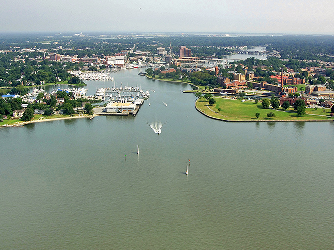 Hampton's waterfront vista unfolds like a postcard come to life, where sailboats dance across the harbor and history whispers from every shoreline.