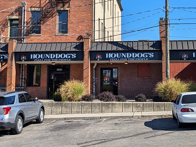 The brick facade and welcoming signage promise pizza adventures that'll make your neighborhood joint jealous.