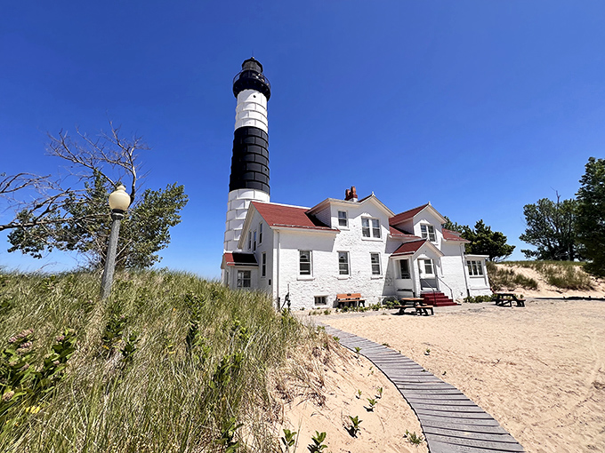 Standing tall against Michigan's endless blue sky, Big Sable's iconic black and white stripes make it the supermodel of Great Lakes lighthouses.