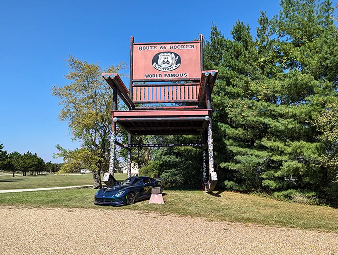 The crimson giant stands tall against the Missouri sky, a whimsical monument to America's love affair with making everyday objects ridiculously oversized.
