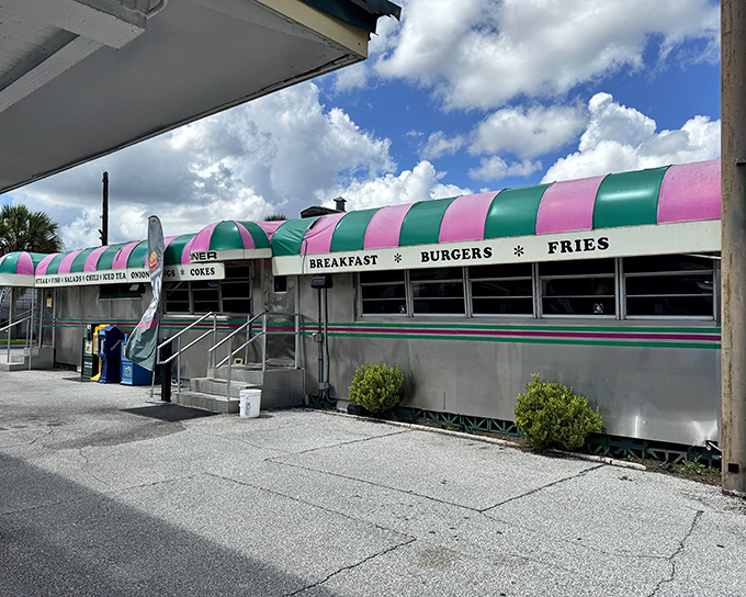 That iconic pink and green awning isn't just eye-catching&mdash;it's a beacon of burger perfection that's been drawing hungry Floridians to Palatka since 1932.