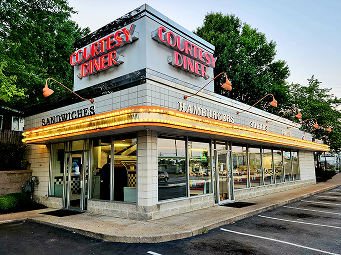 The neon-lit beacon of Courtesy Diner stands proud on Hampton Avenue, its vintage signage promising comfort food salvation to hungry St. Louisans at any hour.