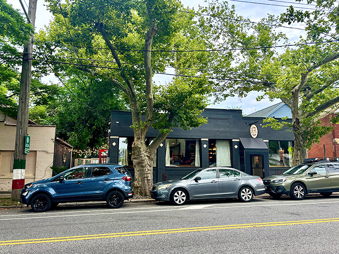 Il Rione's unassuming black exterior hides a pizza paradise within, like finding a secret speakeasy for your taste buds.