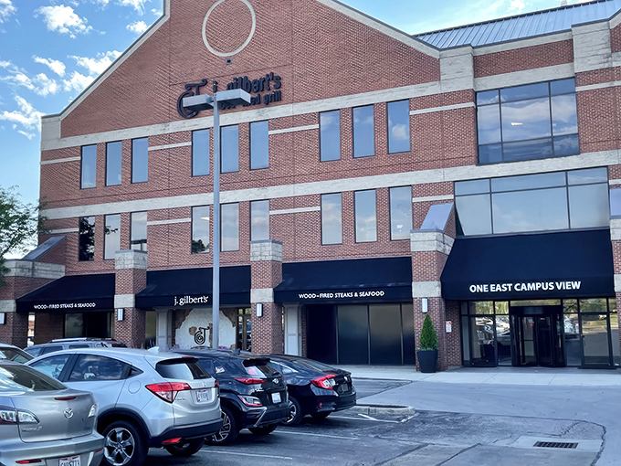 The brick fa&ccedil;ade of J. Gilbert's stands proudly in Worthington, promising wood-fired delights within those walls that have witnessed countless celebration dinners.