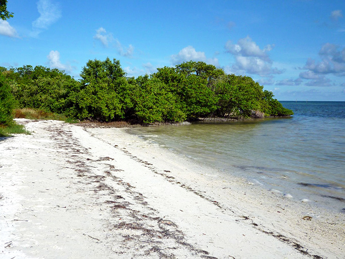 Nature's watercolor palette on full display as the sun bids farewell over the tranquil waters of Anne's Beach. Serenity has never looked so good.
