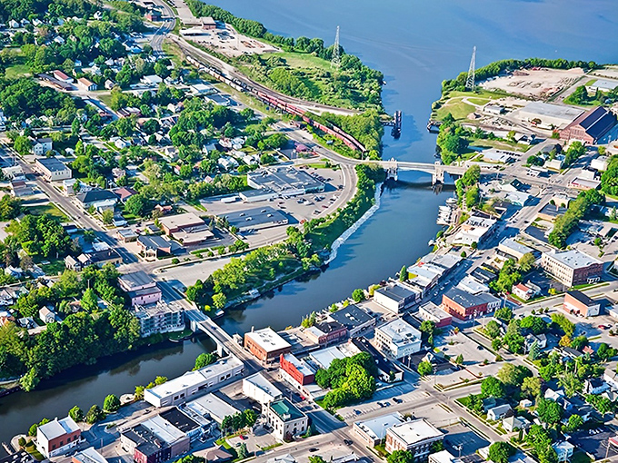Downtown Manistee spreads along the river like a perfectly arranged postcard that forgot to charge admission.