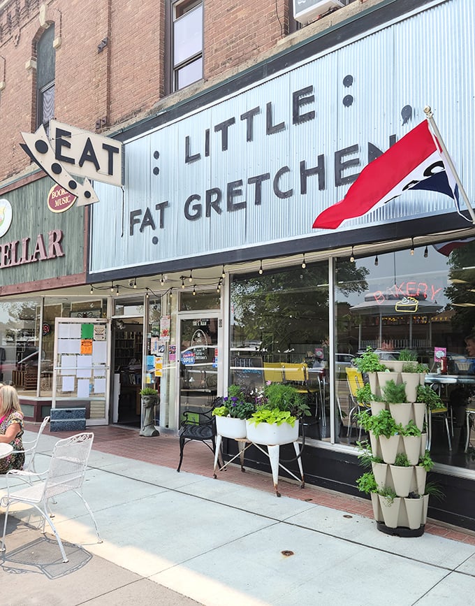 The iconic storefront beckons with its vintage charm and cheerful planters. That "EAT" sign isn't just a suggestion&mdash;it's practically a command.