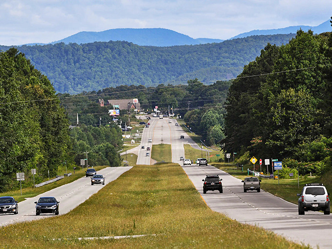 Rolling hills and open roads stretch toward distant mountains like nature's own welcome mat to paradise.