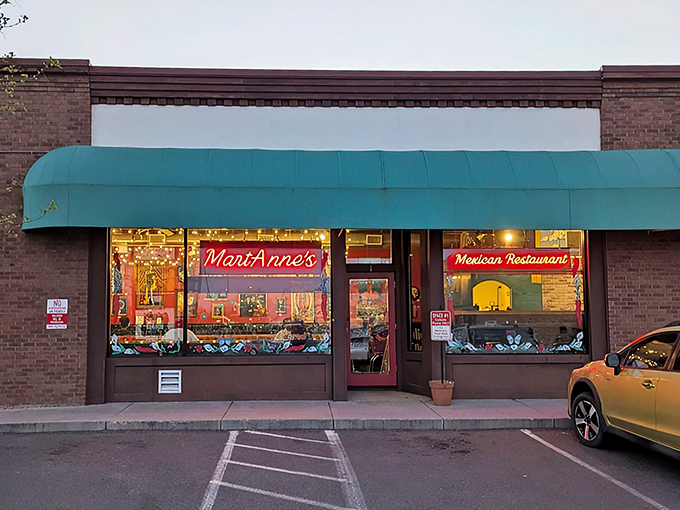 That turquoise awning beckons like a beacon of burrito bliss in downtown Flagstaff's charming streetscape. 